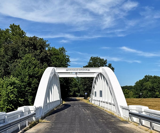The graceful white arch of Rainbow Bridge has carried Route 66 travelers over this Kansas creek since the 1920s.