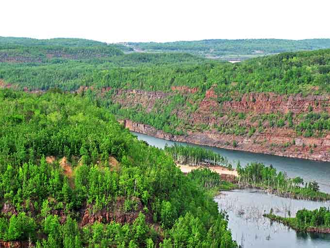 Nature paints with bold colors at Rouchleau Mine, turning industrial scars into an accidental landscape of breathtaking beauty.