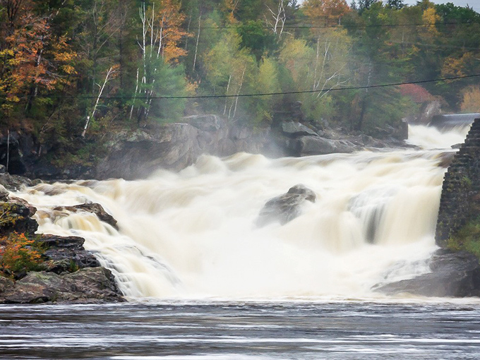 Rumford Falls demonstrates nature's raw power as the Androscoggin River thunders through downtown in a spectacular display.