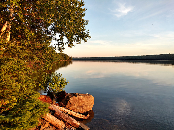 Scopan Lake's wilderness setting creates a swimmer's paradise far from crowds, with waters so clear you can watch fish dart beneath you.