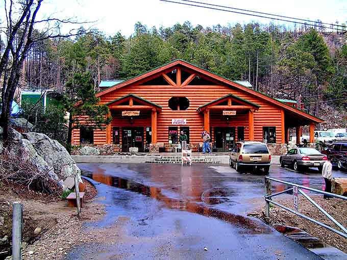 Rustic mountain store welcomes visitors seeking fudge, supplies, and escape from valley heat below.