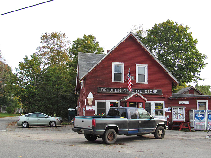 The classic red Brooklin General Store embodies the heart of this small boatbuilding town, where tradition and community spirit thrive.