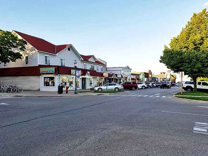 Charming storefronts line Mackinaw City's main street, inviting visitors to explore local treasures and tasty treats.