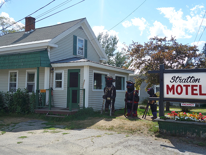 The quirky Stratton Motel with its wooden carved figures offers lodging with personality in this gateway to Maine's wilderness.