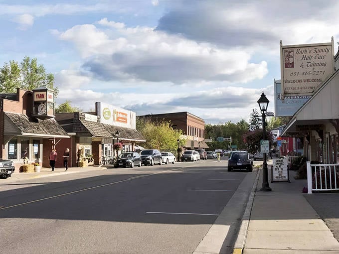 The charming main street of Taylors Falls welcomes visitors seeking both small-town atmosphere and outdoor adventures along the river.
