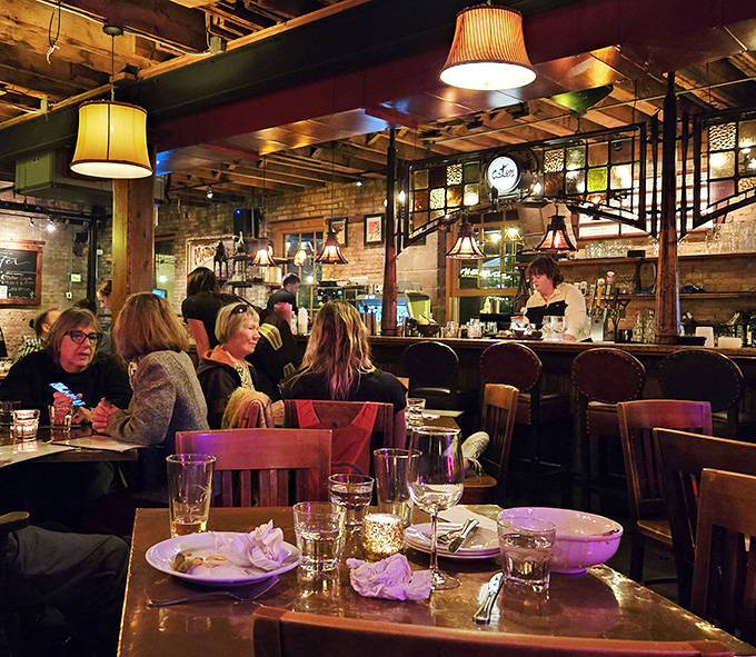 The dining room buzzes with that perfect energy – not too loud, not too quiet – where memories are made over shared plates and laughter.