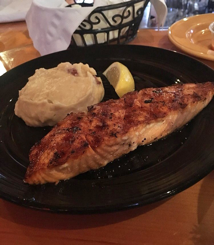 Honey-glazed salmon with a perfect caramelized exterior &ndash; proof that seafood in Maine isn't just about lobster.