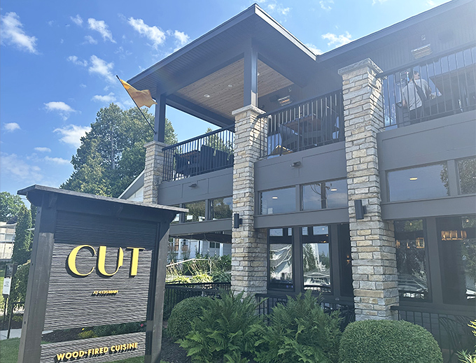 CUT Restaurant elevates Door County dining with its modern stone facade and promise of wood-fired culinary adventures.