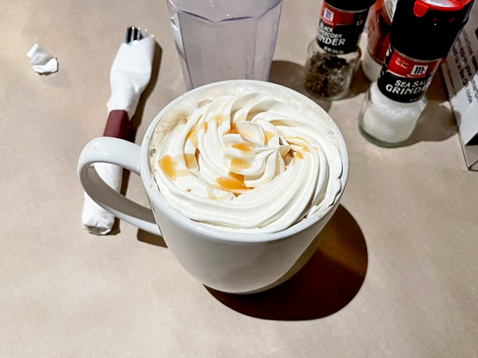 That's not just a caramel latte &ndash; it's a cloud-topped cup of liquid motivation with artistic swirls that deserve their own gallery showing.