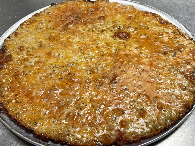 Cheese Pizza: The slightly nutty, perfectly browned cheese blend on Fricano's signature thin crust proves that sometimes the simplest option is actually the most extraordinary.