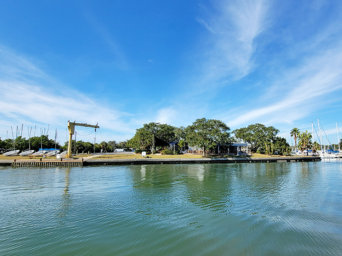 The marina stands as Gulfport's nautical heart, where sailboats and fishing vessels find shelter in waters that reflect Florida's famously blue skies.