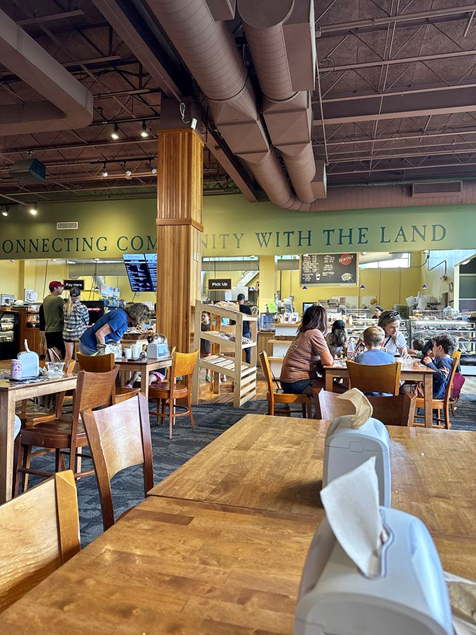The spacious dining area invites lingering conversations under the "Connecting Community with the Land" mantra that Pineland Farms lives by daily.
