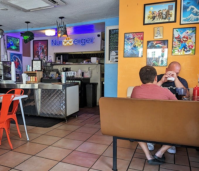 The casual, comic-adorned dining room invites lingering conversations over the last precious fries and shake sips.