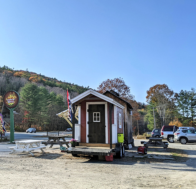 Even in winter, Smokin' Bowls stands like a beacon of warmth. Snow on the roof, fire in the bowls.