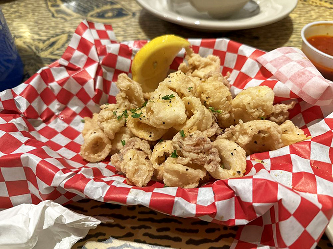 Crispy, tender rings and tentacles that convert squid skeptics into believers &ndash; the ultimate shareable starter that disappears faster than you'd expect.