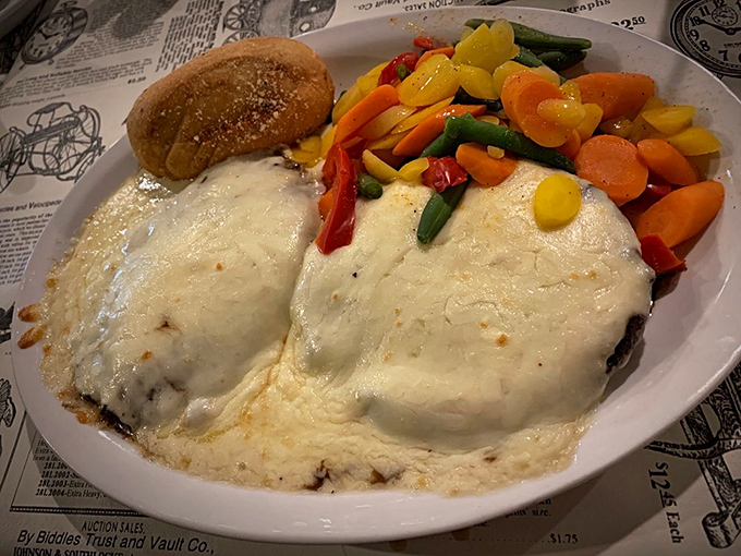 A colorful plate featuring grilled vegetables that proves The Grill House knows its way around more than just meat.