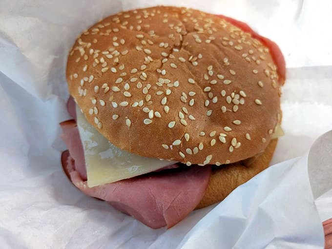The ham and swiss sandwich on a kaiser roll offers a delicious alternative for those seeking something beyond burgers and custard.