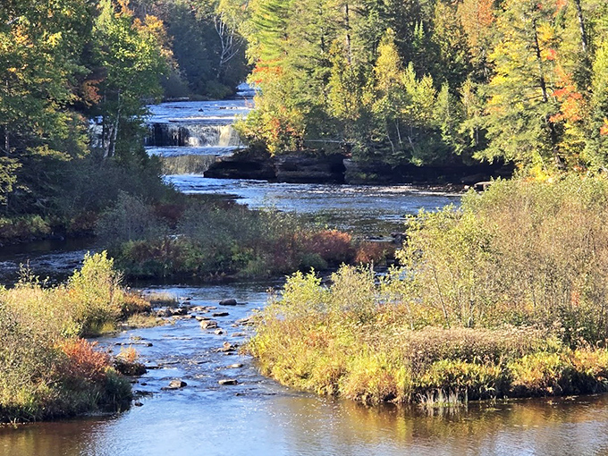 The Lower Falls area offers a more intimate waterfall experience, where multiple smaller cascades create a playground of rushing water and mist-kissed rocks.
