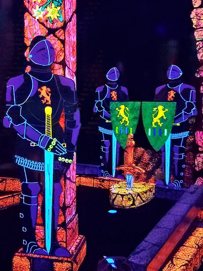 Knights of neon! Medieval warriors glow in blacklight splendor, guarding their fluorescent castle with electric blue swords and heraldic shields ablaze.