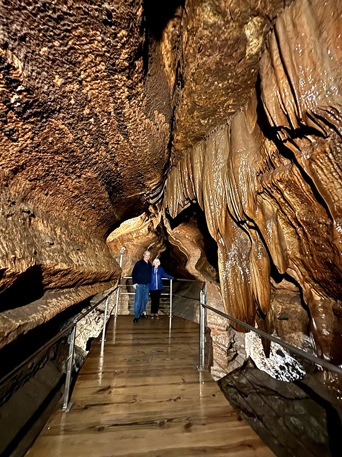 Deep within Niagara Cave, visitors stand dwarfed by massive formations, where each drip of water continues a sculptural process millions of years in the making.