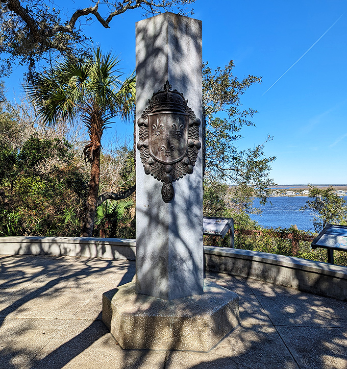 The Ribault Monument stands as a silent sentinel overlooking the St. Johns River, commemorating the French explorer who first claimed this paradise.