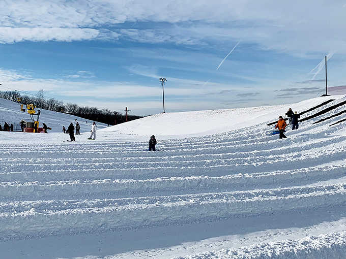 Snowy hill adventure: Perfectly groomed lanes invite speed demons of all ages &ndash; where "Watch this!" is either followed by impressive skills or hilarious tumbles.