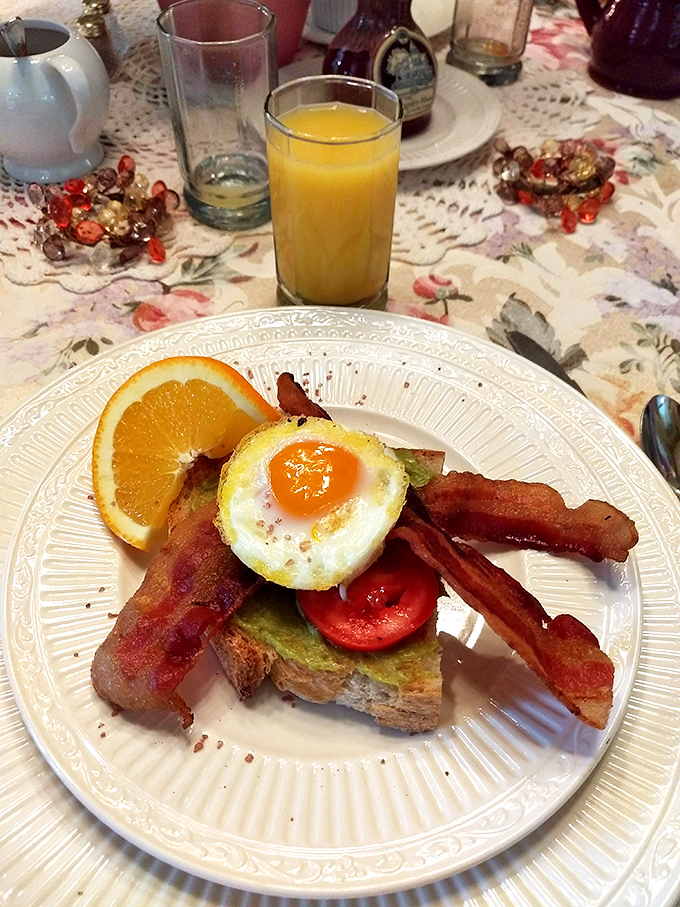 Breakfast isn't just a meal but an event &ndash; avocado toast crowned with a sunny egg alongside crisp bacon that would make any morning memorable.