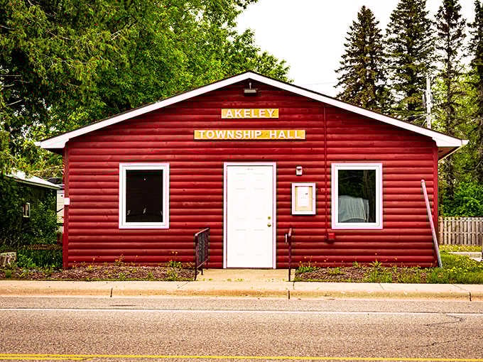 The bright red Akeley Township Hall serves as both government center and unofficial timekeeper of community memory going back generations.