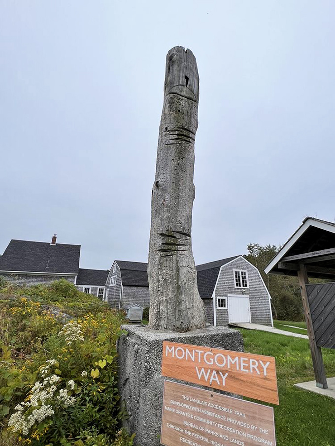 A unique wooden display featuring carved figures tells stories of people and animals, their simplified forms speaking volumes about connection.