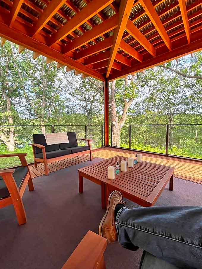 The covered deck offers front-row seats to nature's daily show, with comfortable seating that encourages lingering long after you've finished your coffee.