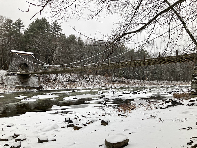 Winter blankets the Wire Bridge in a quiet, stark beauty, offering a strikingly different perspective from its lush summer greenery and vibrant autumn colors.
