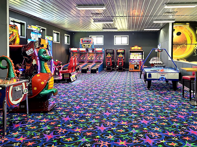 The arcade's star-studded carpet and colorful games provide welcome relief from the sun and a chance to win coveted tickets.