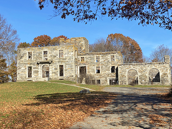 Autumn's embrace: Fall foliage creates a colorful contrast against the gray stone walls of this Cape Elizabeth landmark.