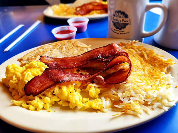 Morning glory on a plate &ndash; fluffy eggs, crisp bacon, and hash browns that could convert a carb-counter.