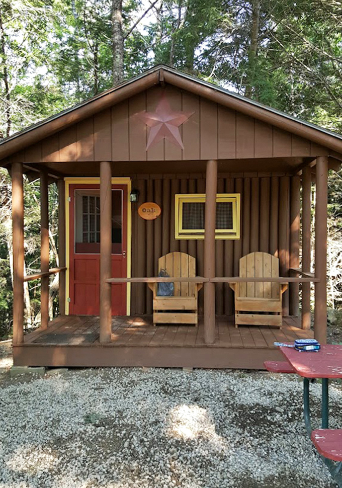 Charming cabins offer a perfect middle ground between tent camping and hotel stays, complete with inviting front porches.
