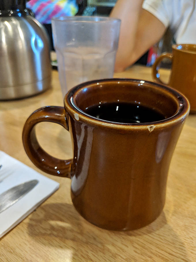 Coffee served in sturdy mugs that keep your hands warm while trading fishing stories with locals.