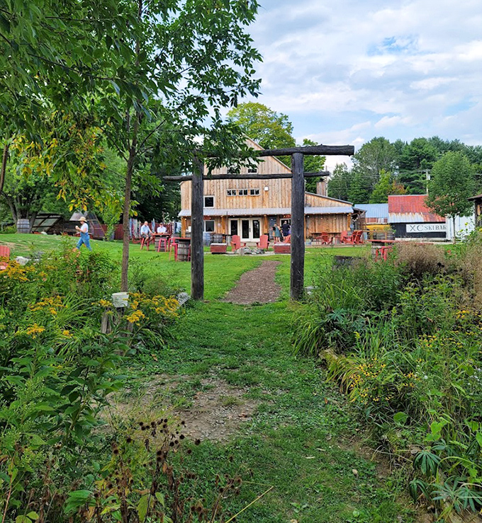 Follow the path through wildflowers and tall grasses to discover the beer garden's hidden corners, where afternoon easily melts into evening.