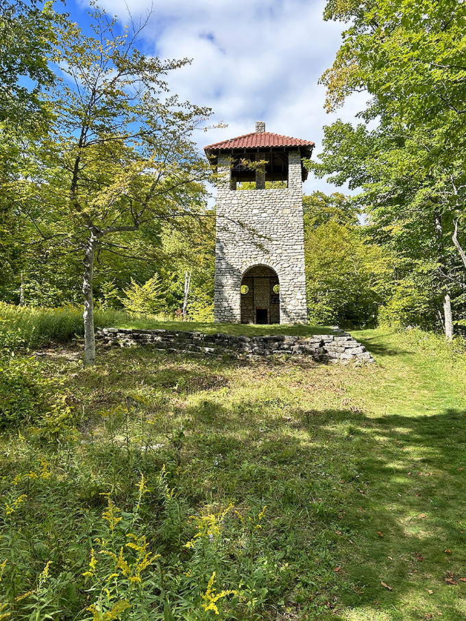This stone observation tower stands like a medieval sentry, offering panoramic views that reward those who make the climb to the top.