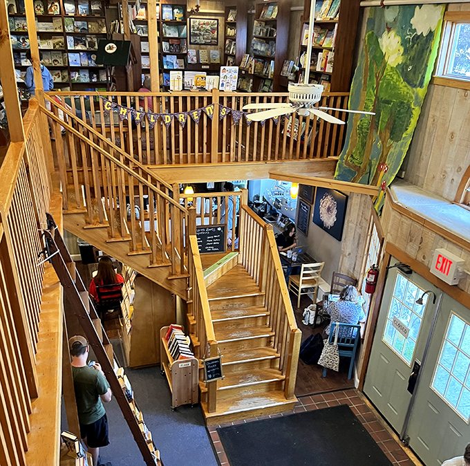 The wooden staircase doesn't just connect floors—it bridges worlds, each step bringing you closer to undiscovered literary treasures.