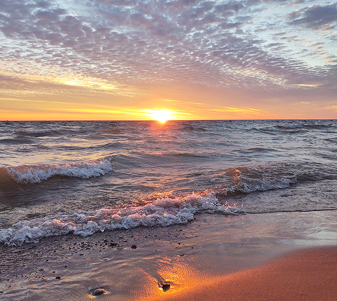 The golden hour transforms Lake Huron into liquid amber &ndash; worth setting an alarm for, even on vacation.