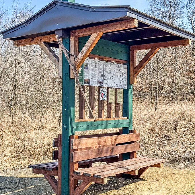 This rustic trailside kiosk offers a moment's rest and valuable information for curious adventurers exploring the valley.
