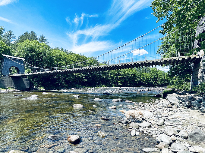 The bridge's silhouette against a brilliant blue sky showcases the elegant simplicity that has outlasted countless "modern" structures.