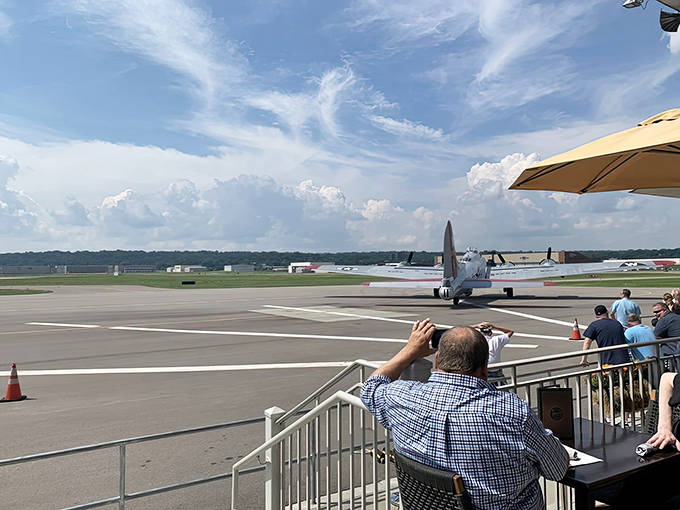 The patio offers front-row seats to runway action, where dining tables meet tarmac for an experience that soars above ordinary.