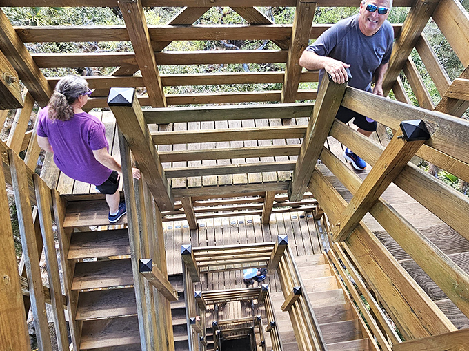 Looking down the wooden staircase creates a dizzying optical illusion &ndash; like M.C. Escher designed a treehouse for the Swiss Family Robinson.