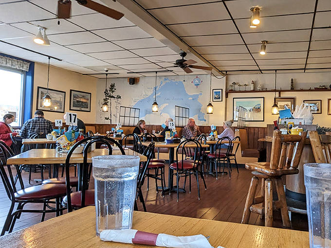 The dining room buzzes with conversation as locals and visitors alike gather at "The meeting place in Grand Marais" for food and fellowship.