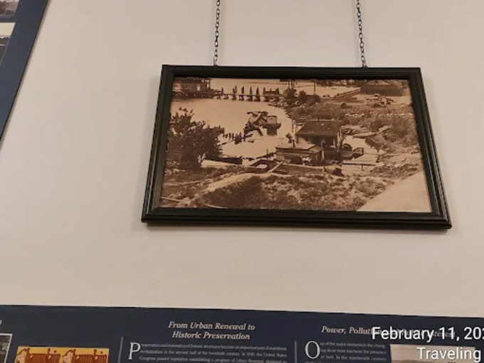 A sepia-toned photograph displays Burlington's waterfront history, showing how the area has evolved from industrial uses to today's vibrant public space.
