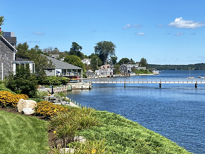 Castine's waterfront charm shines with coastal homes nestled along the shoreline, creating a peaceful haven for boating enthusiasts.