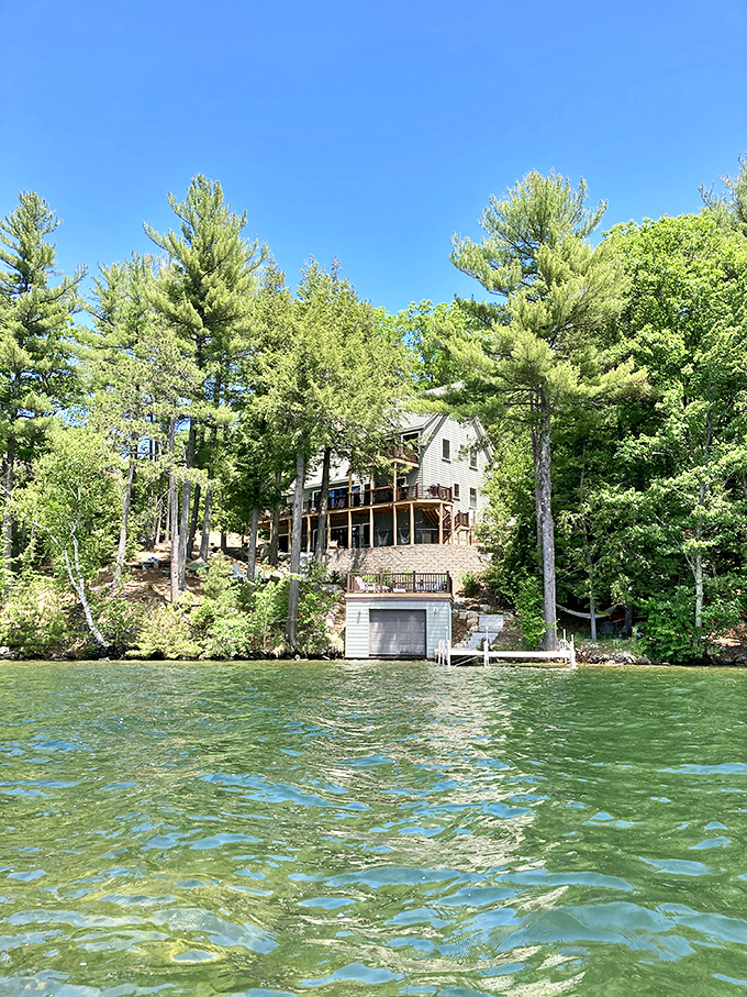 Great East Lake's sandy shoreline leads to waters so clear that swimmers can see their shadows on the lake bottom.
