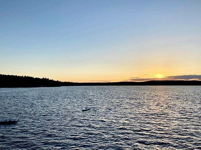 A perfect swimming dock extends into Great East Lake's pristine waters, inviting visitors to dive into some of Maine's clearest depths.