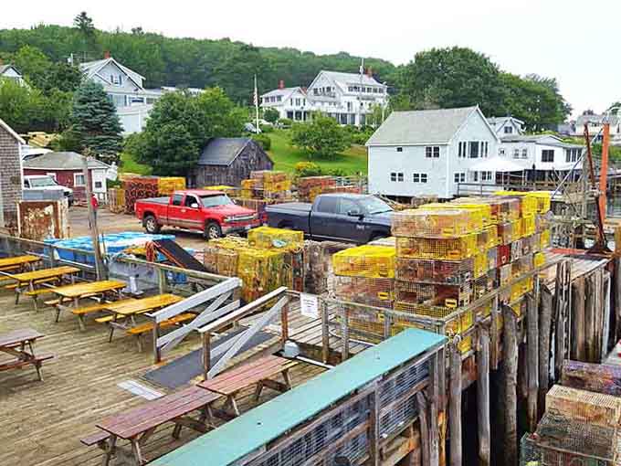 Colorful lobster traps stacked on the dock tell the story of Maine's working waterfront, where movie magic and real life exist side by side in perfect harmony.